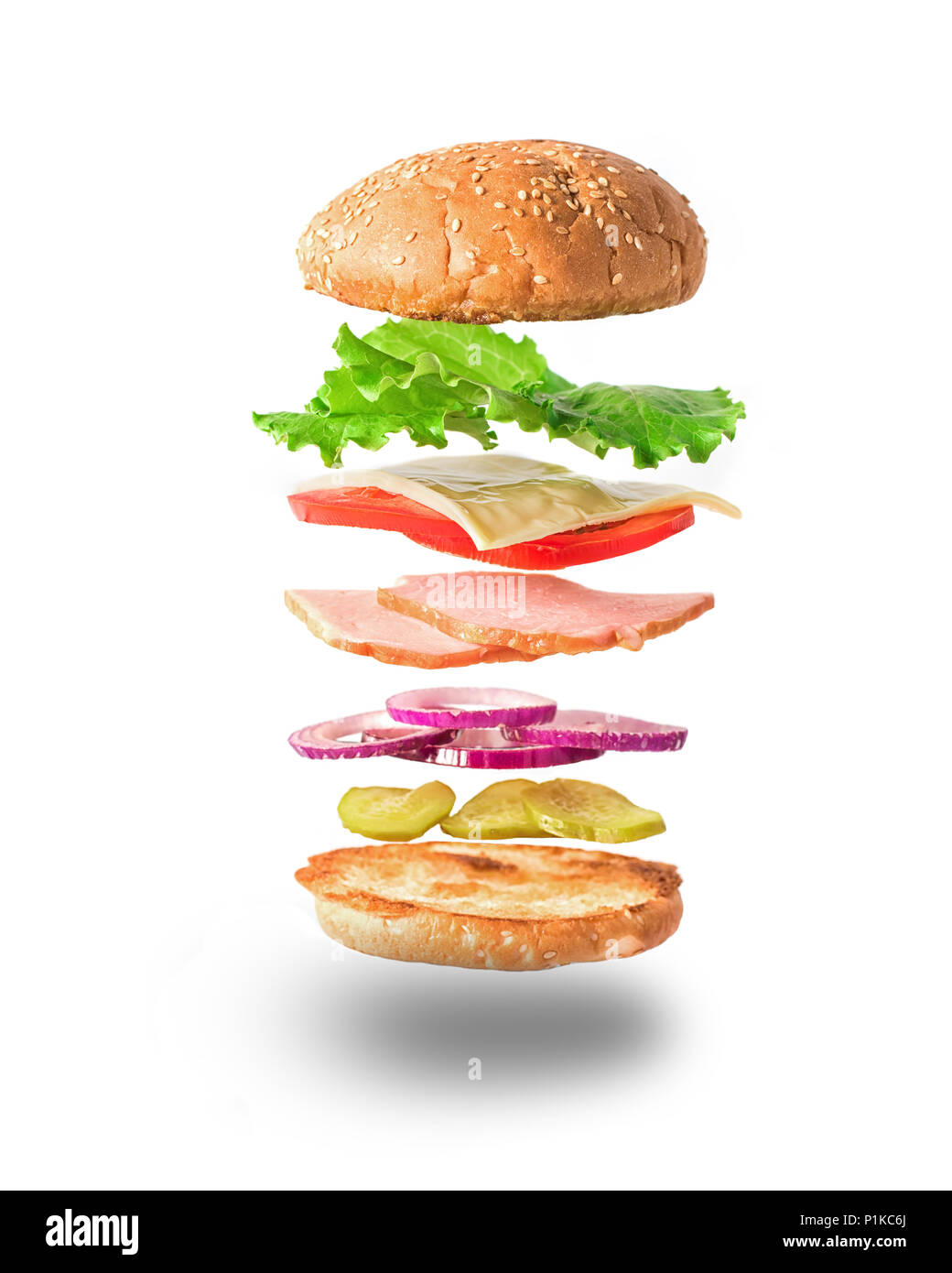 Fresh sandwich with flying ingredients isolated on white background ...