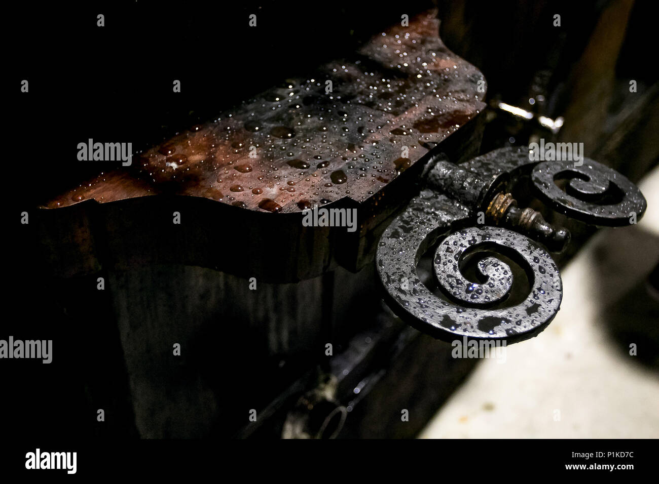 Large valve on a 19th century barrel that is still in use in the cellar ...