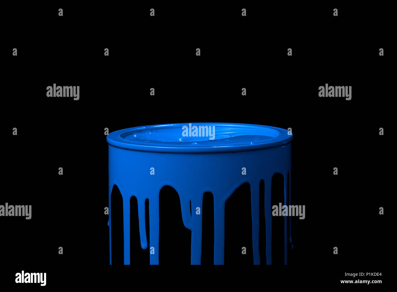 Colorful paint leaking down over the part of metal bucket. Isolated ...