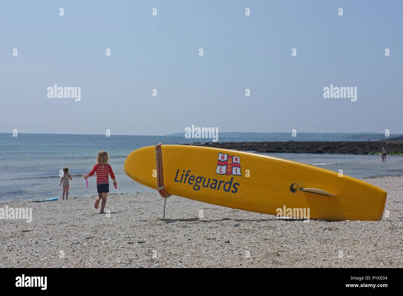 Lifeguards sign on beach hi-res stock photography and images - Alamy