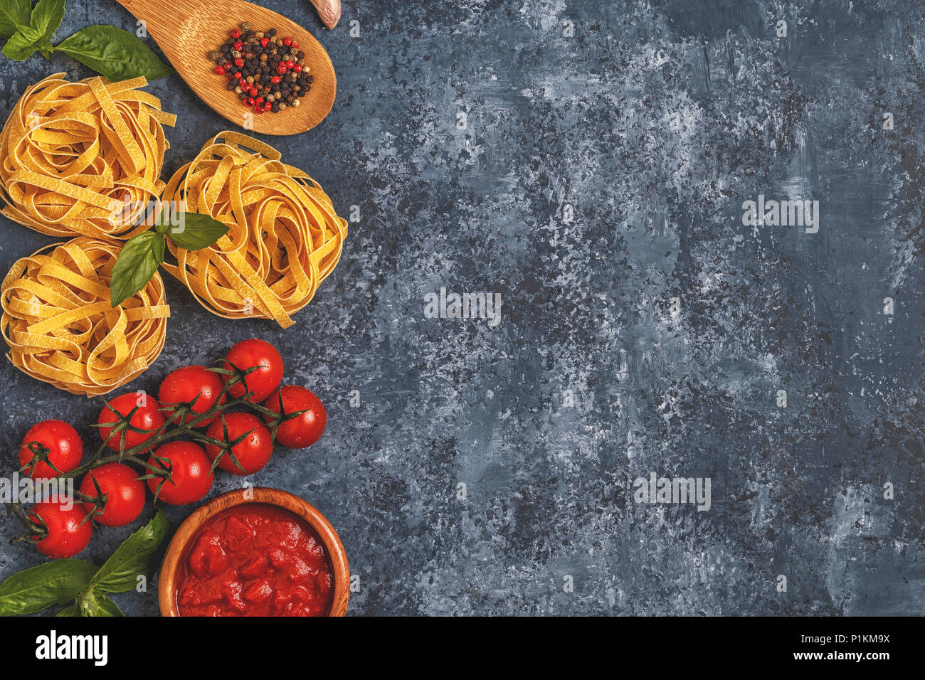 Italian food background with pasta, spices and vegetables. Top view ...