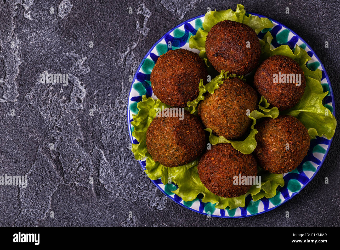 Classic falafel on the plate. Top view, copy space Stock Photo - Alamy