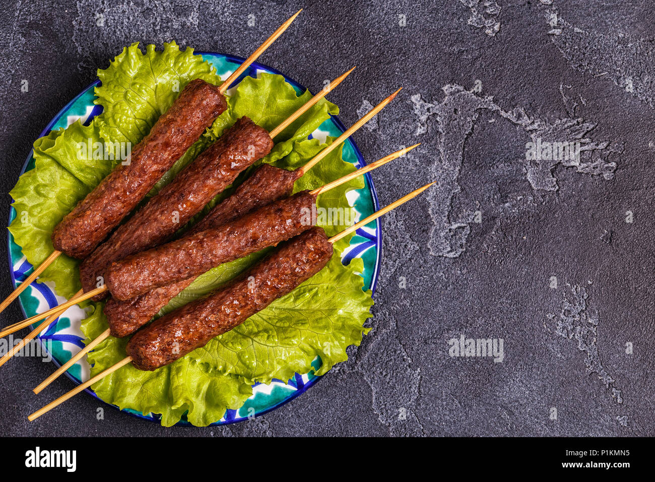 Classic kebabs on the plate. Top view Stock Photo - Alamy