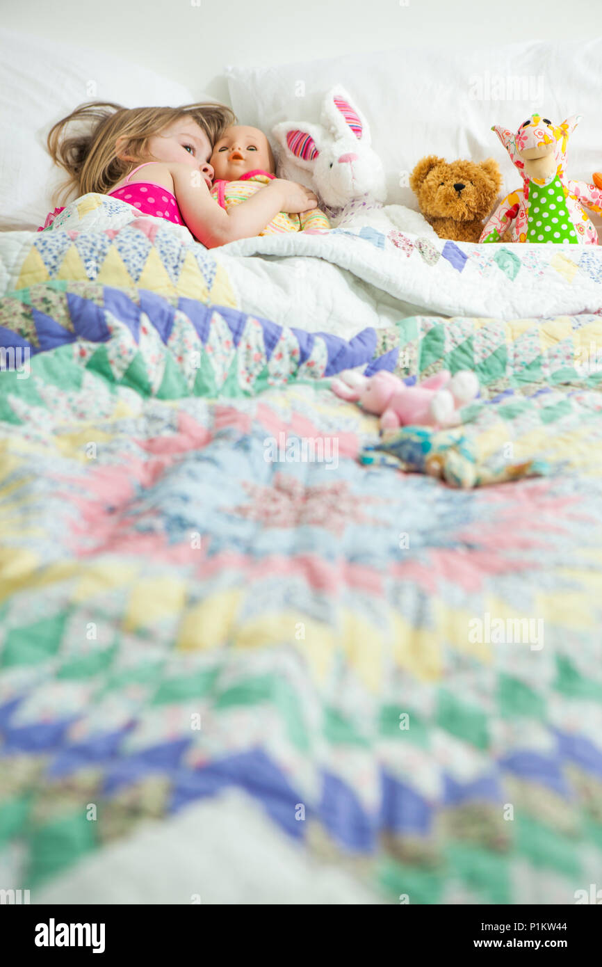 Tucked in baby hi-res stock photography and images - Alamy
