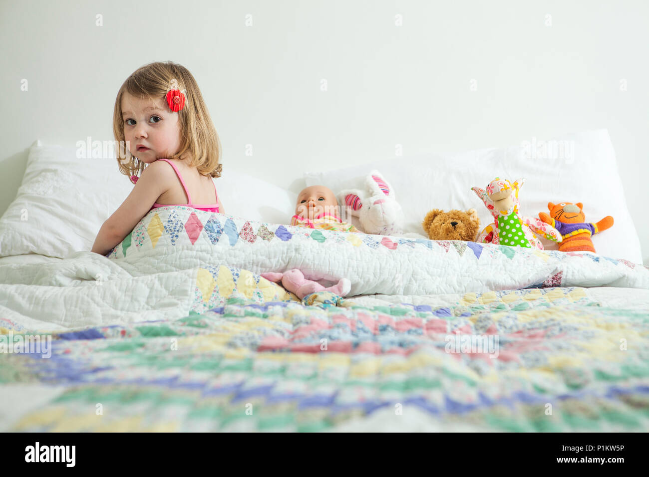 Tucked up in bed hi-res stock photography and images - Alamy