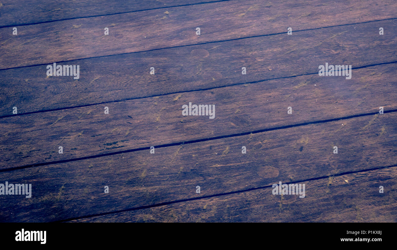 Wooden Plank under Water Stock Photo - Alamy