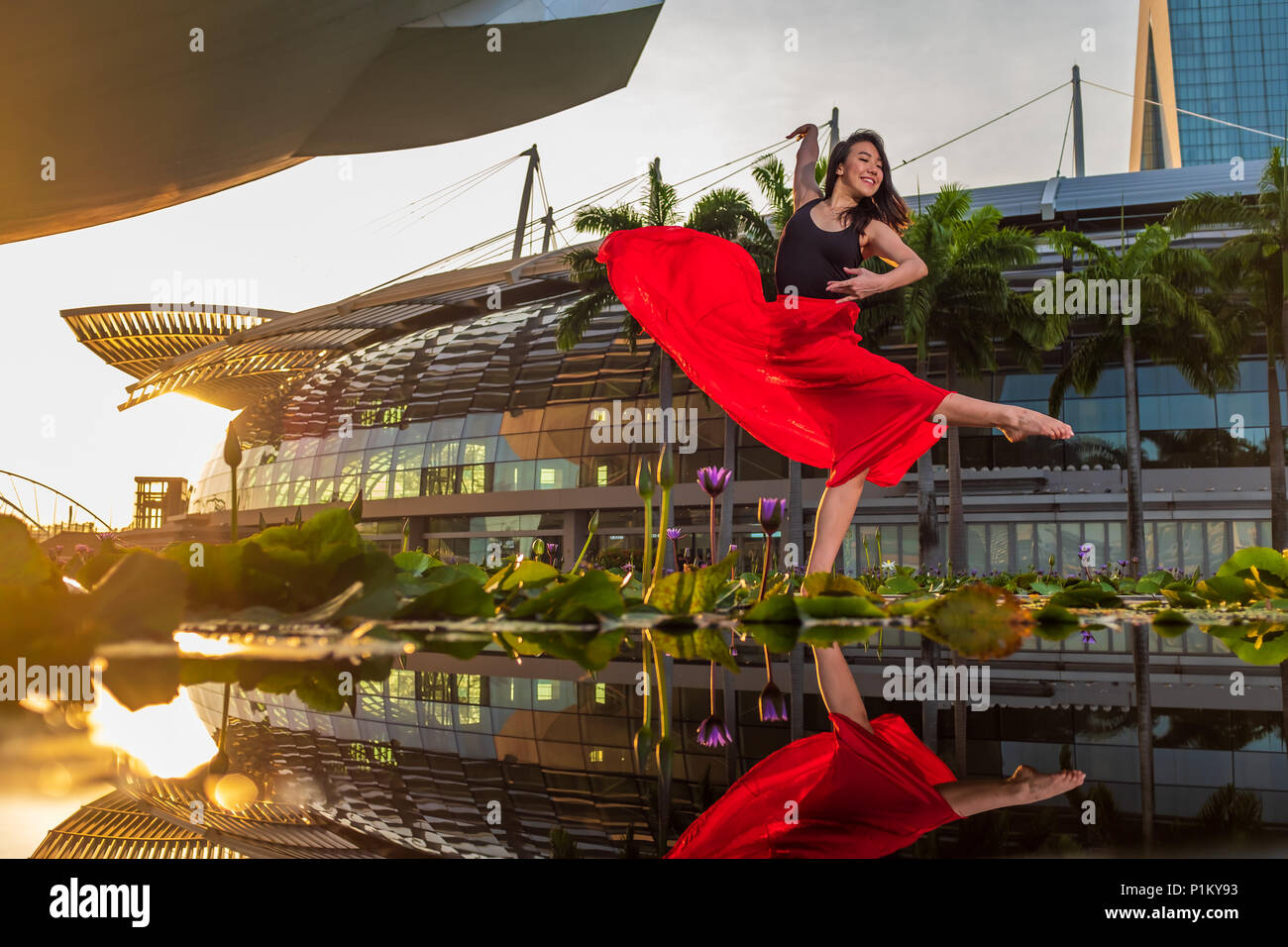 Elegant ballet dancer woman dancing ballet in Singapore city Stock ...