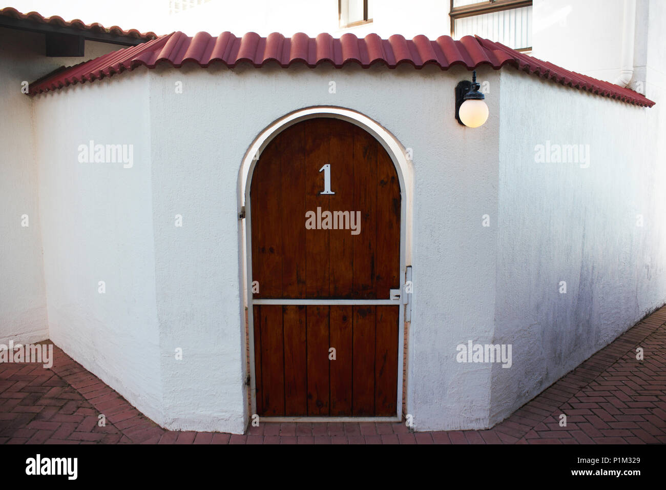 Tuscan Style Front Gate Number One With Light Stock Photo - Alamy
