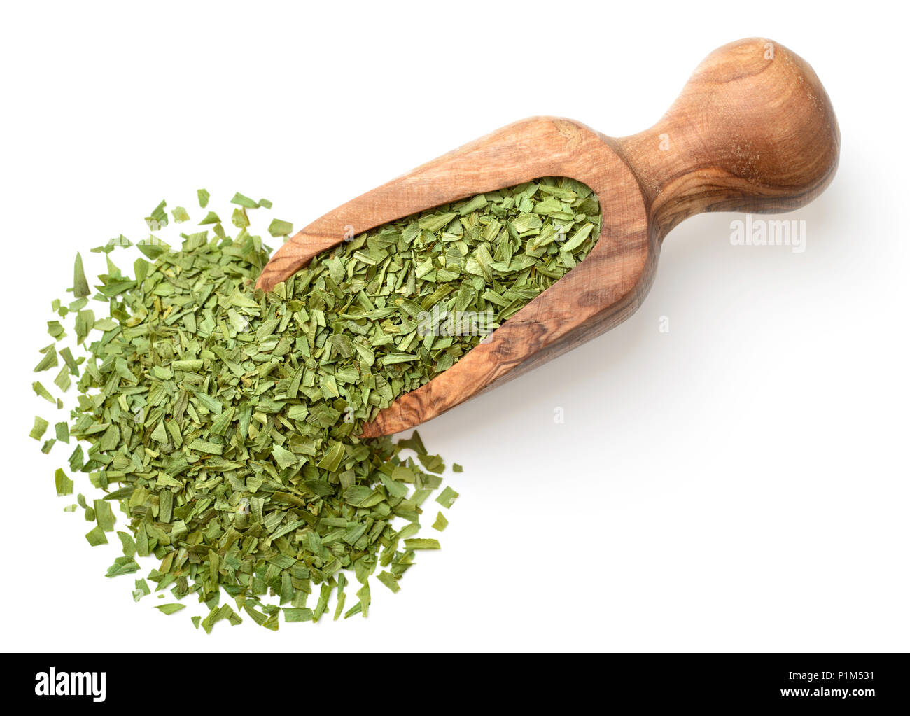 chopped tarragon leaves isolated on white background Stock Photo - Alamy
