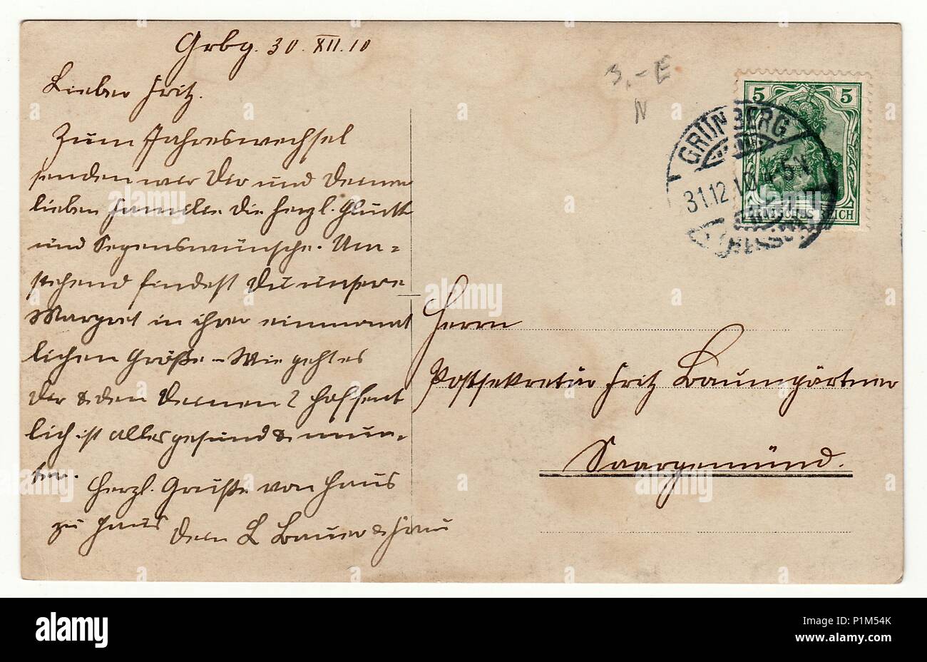 GERMANY - DECEMBER 30, 1910: Back of a vintage photo - used postcard ...