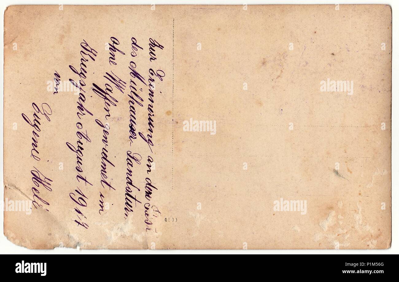 GERMANY - 1917: Back of a vintage photo - used postcard. Rich stain and ...