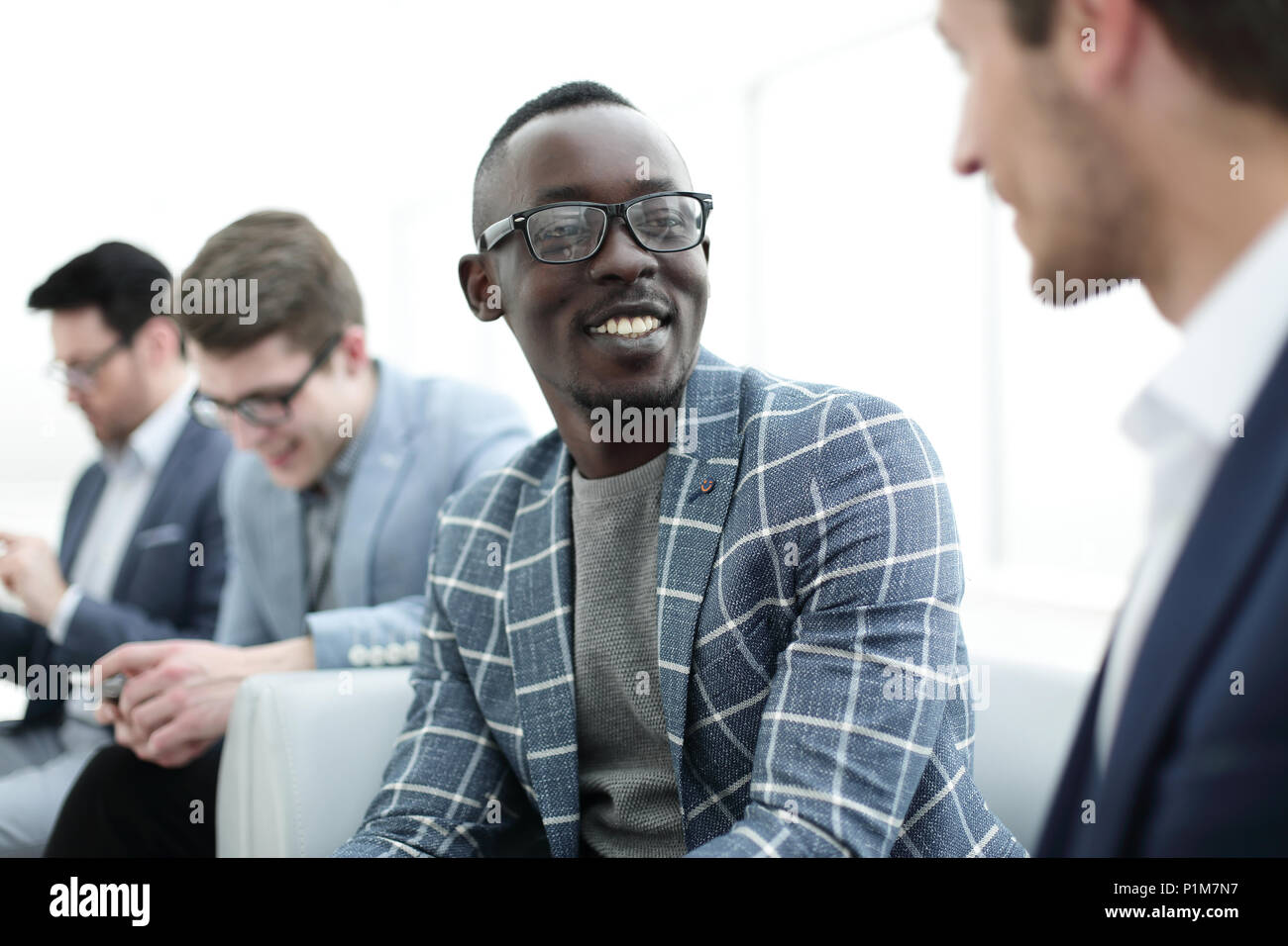close up. employees of the company talk during a working break Stock ...