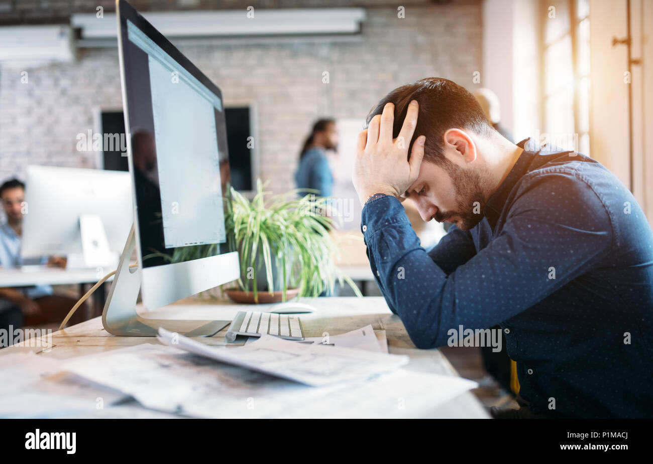 Overworked employee hi-res stock photography and images - Alamy