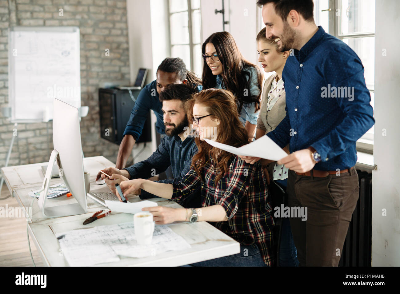 Team programmers coworking in office hi-res stock photography and ...