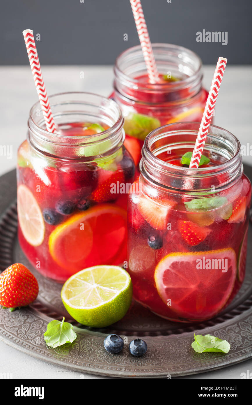 summer berry lemonade with lime and mint in mason jar Stock Photo - Alamy