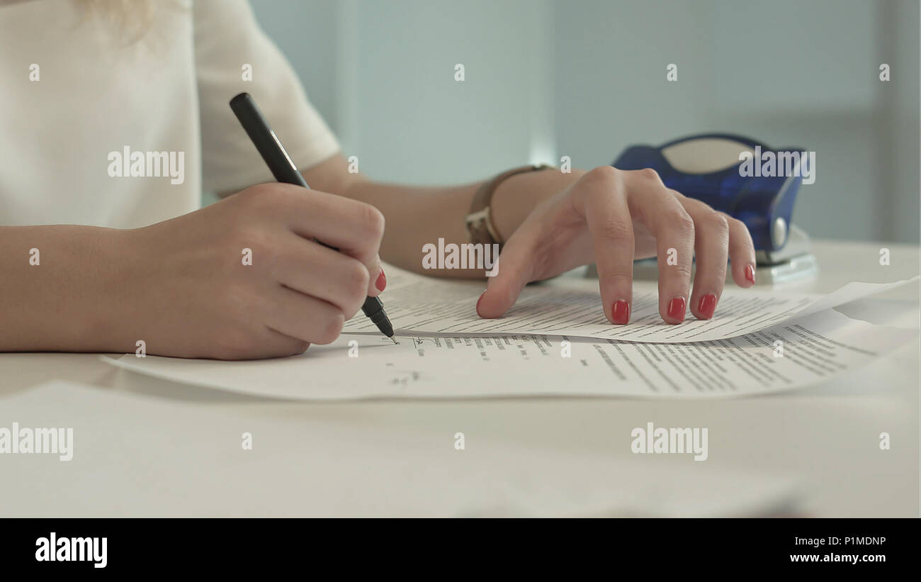 Using hole punch tool hi-res stock photography and images - Alamy