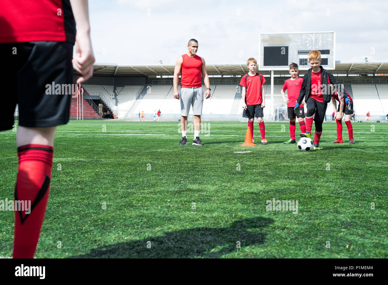 Group of Kids at Football Practice Stock Photo - Alamy