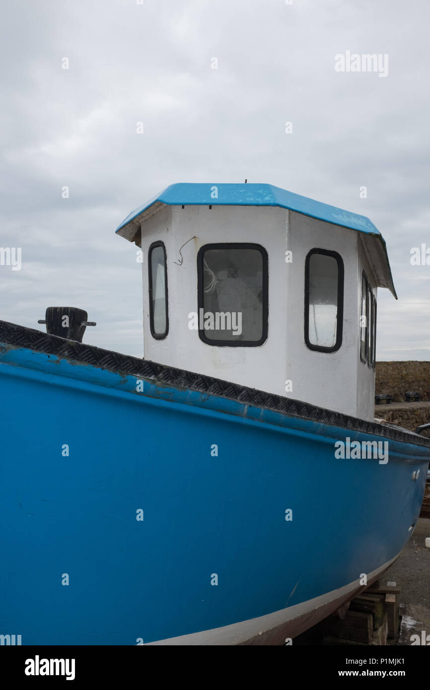 Blue and white fishing boat in the Crail harbour, Crail, Fife, UK Stock ...
