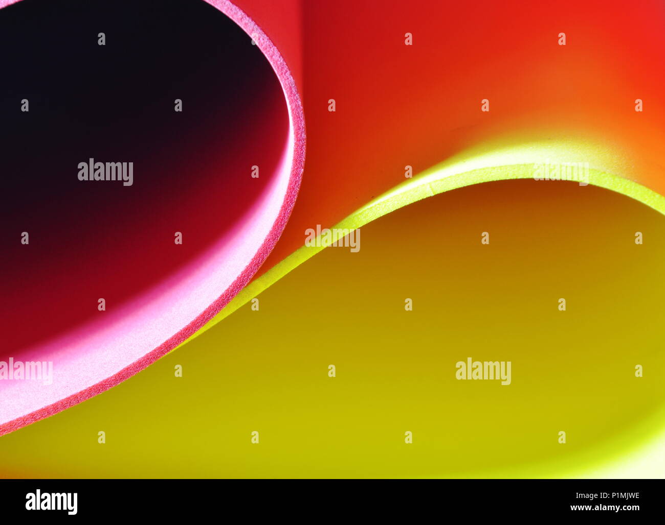 curve of color foam rubber board roll Stock Photo - Alamy