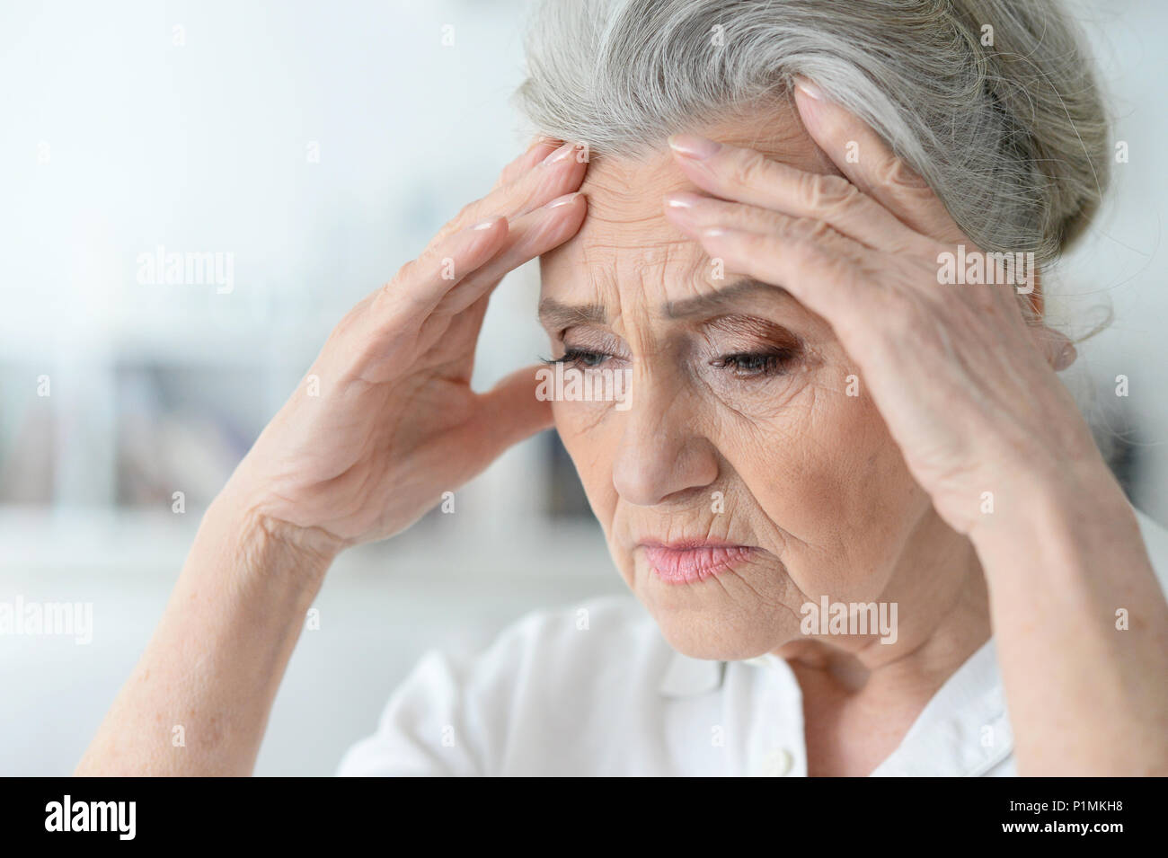 beautiful Sad senior woman Stock Photo - Alamy