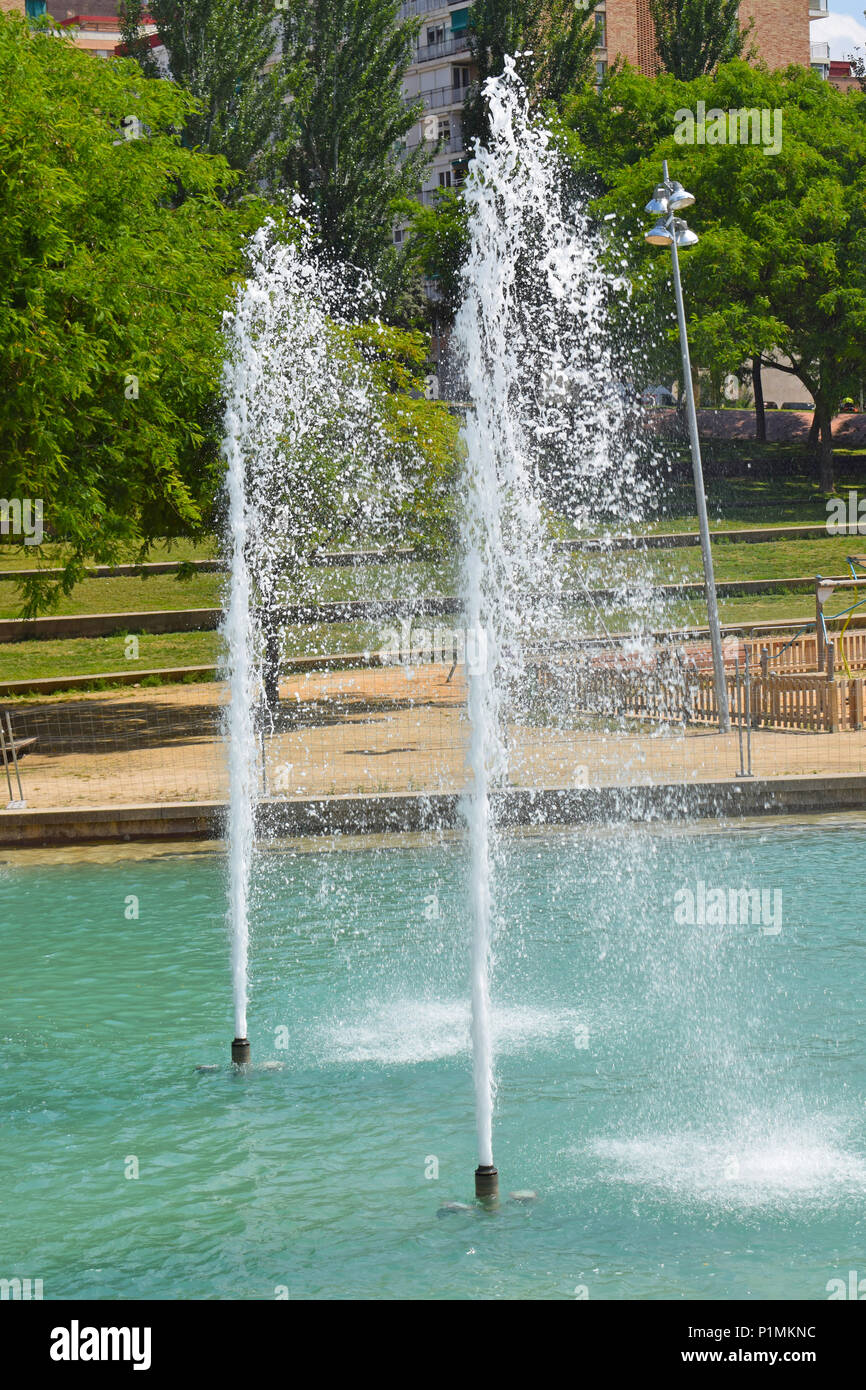 Water jet in public garden of Barcelona Stock Photo - Alamy