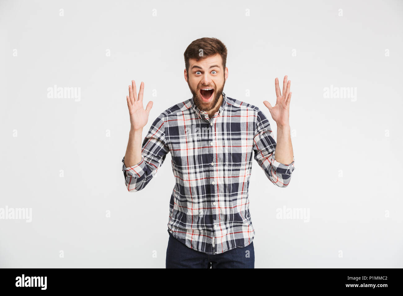 Excited young man celebrating hi-res stock photography and images - Alamy