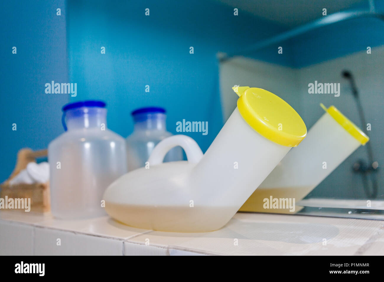 Plastic cylinder To keep the urine of the patient in hospital To be ...