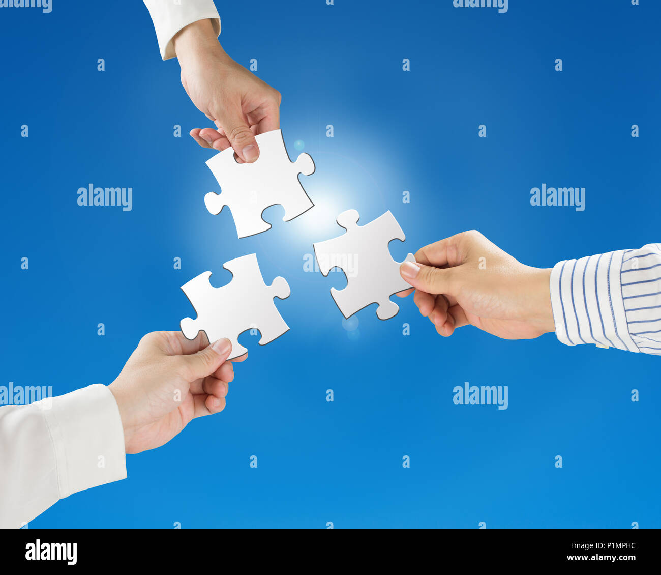 Team work puzzles hi-res stock photography and images - Alamy
