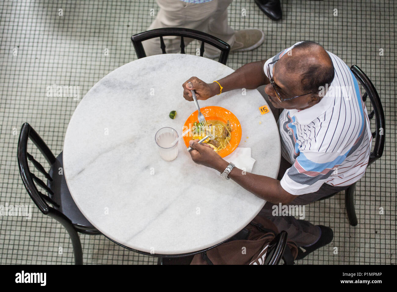 Dining alone hi-res stock photography and images - Alamy