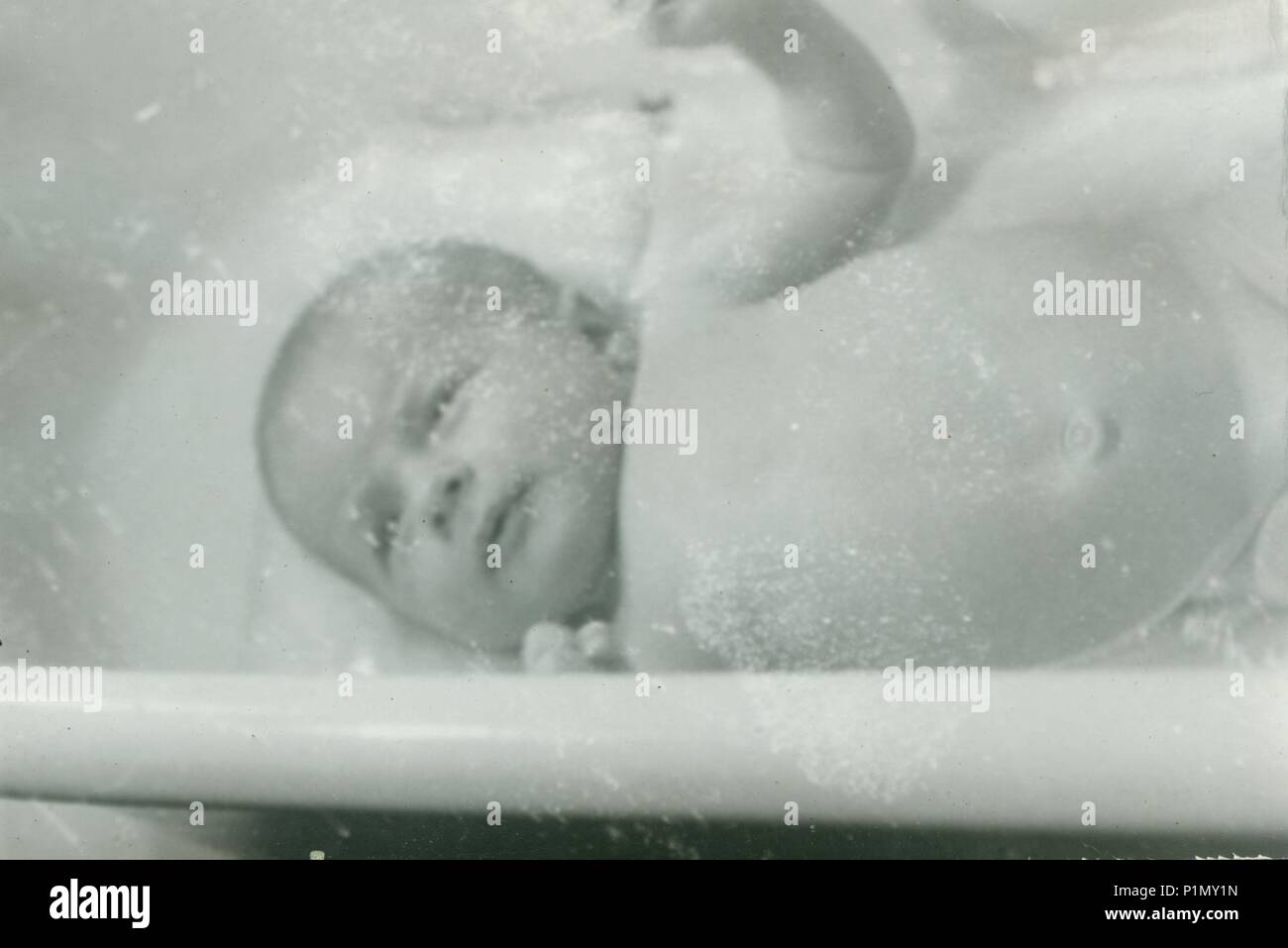 THE CZECHOSLOVAK SOCIALIST REPUBLIC - 1959: Retro photo shows newborn ...