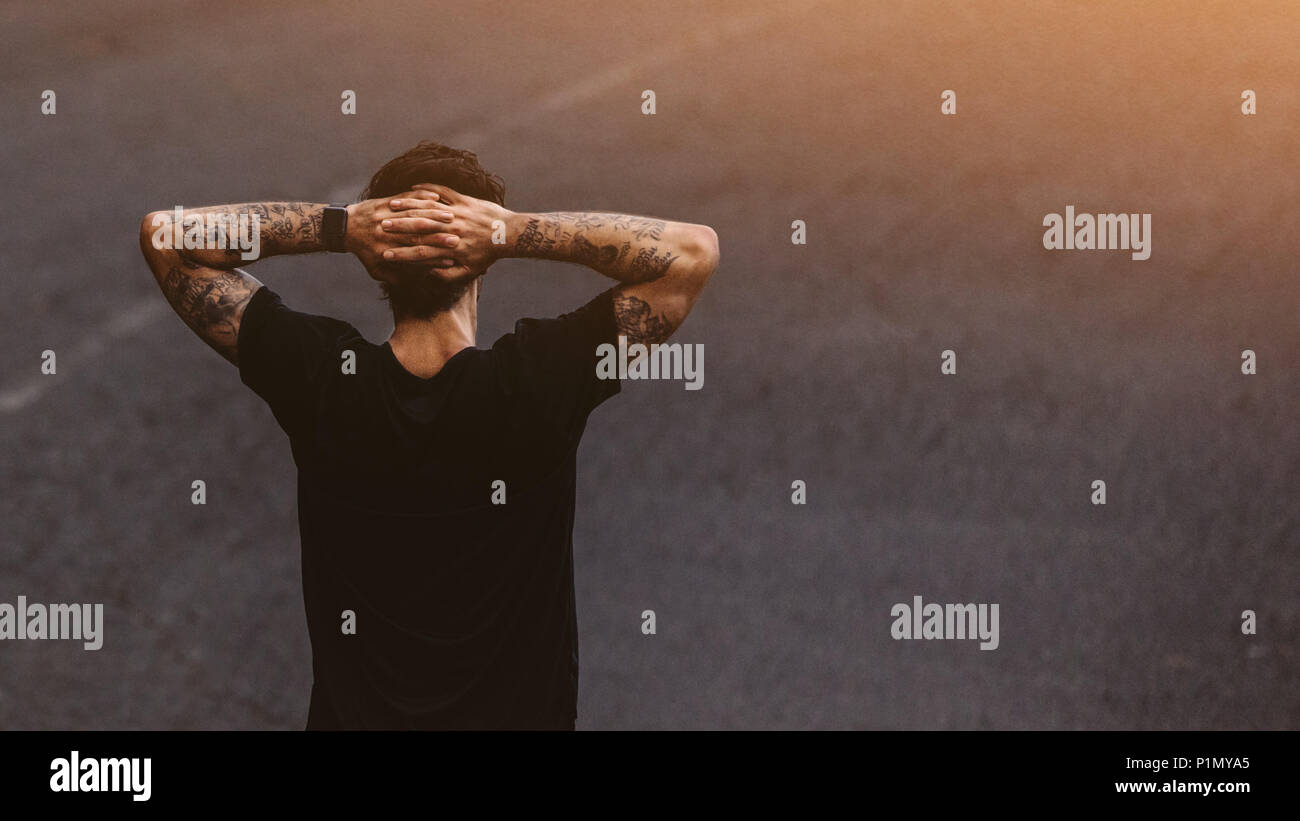 Back view man hands behind his hi-res stock photography and images - Alamy