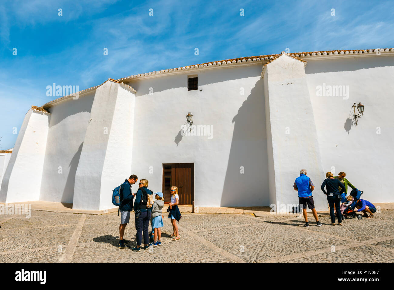 Ronda, Spain, April 05, 2018: White wall of Plaza de Toros in Ronda ...