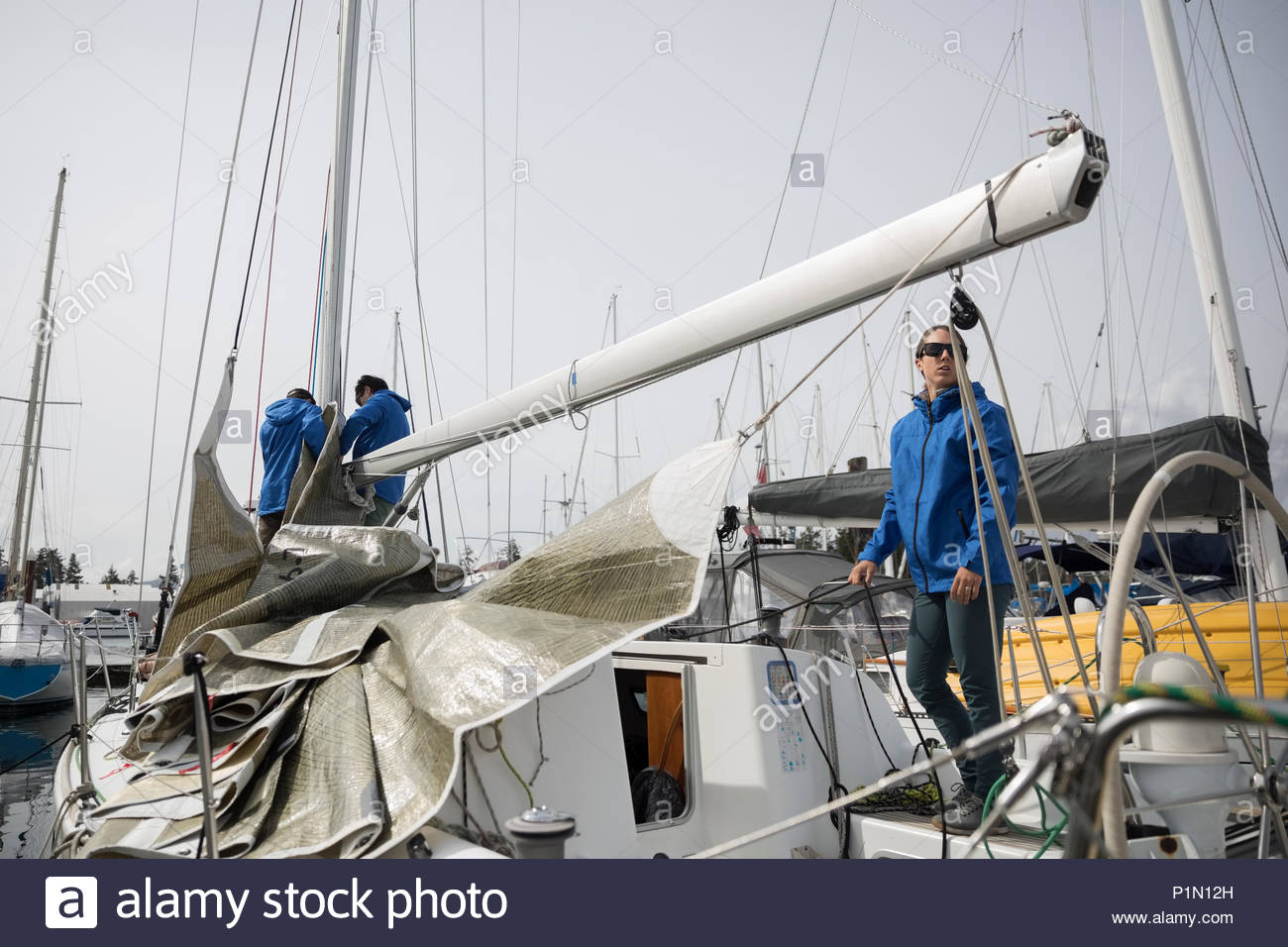 Standing on sailboat mast hi-res stock photography and images - Alamy