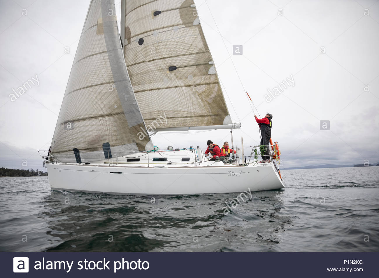 Adjusting sail hi-res stock photography and images - Alamy