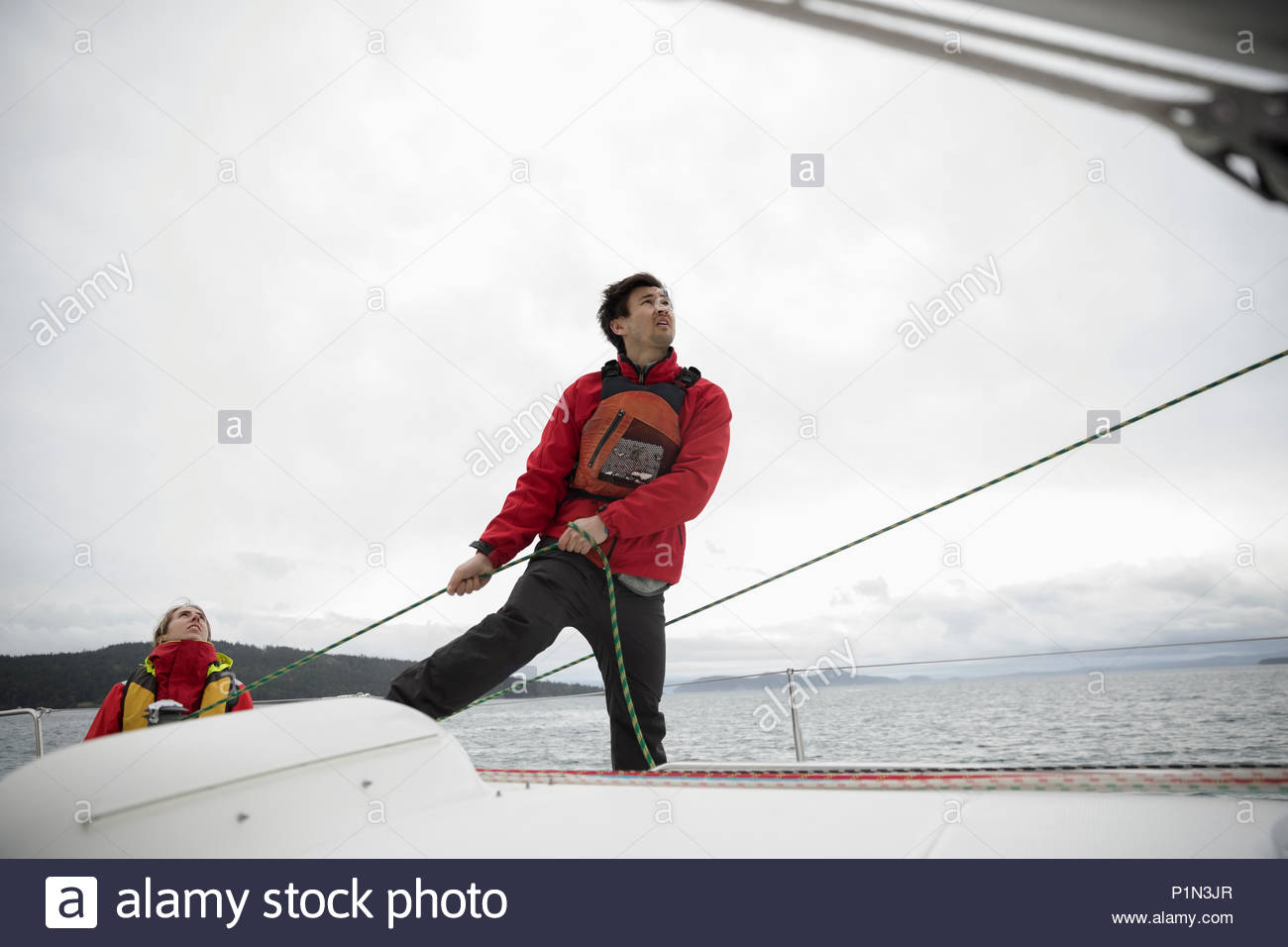 Young man working up rigging hi-res stock photography and images - Alamy