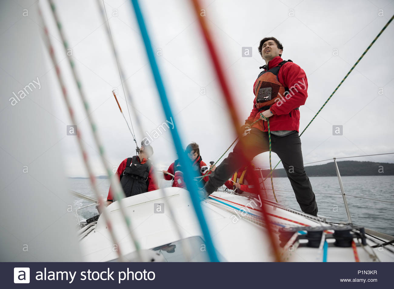 Man pulling on rope hi-res stock photography and images - Alamy