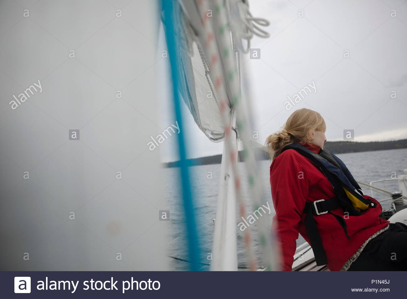 Woman sailing red hair hi-res stock photography and images - Alamy