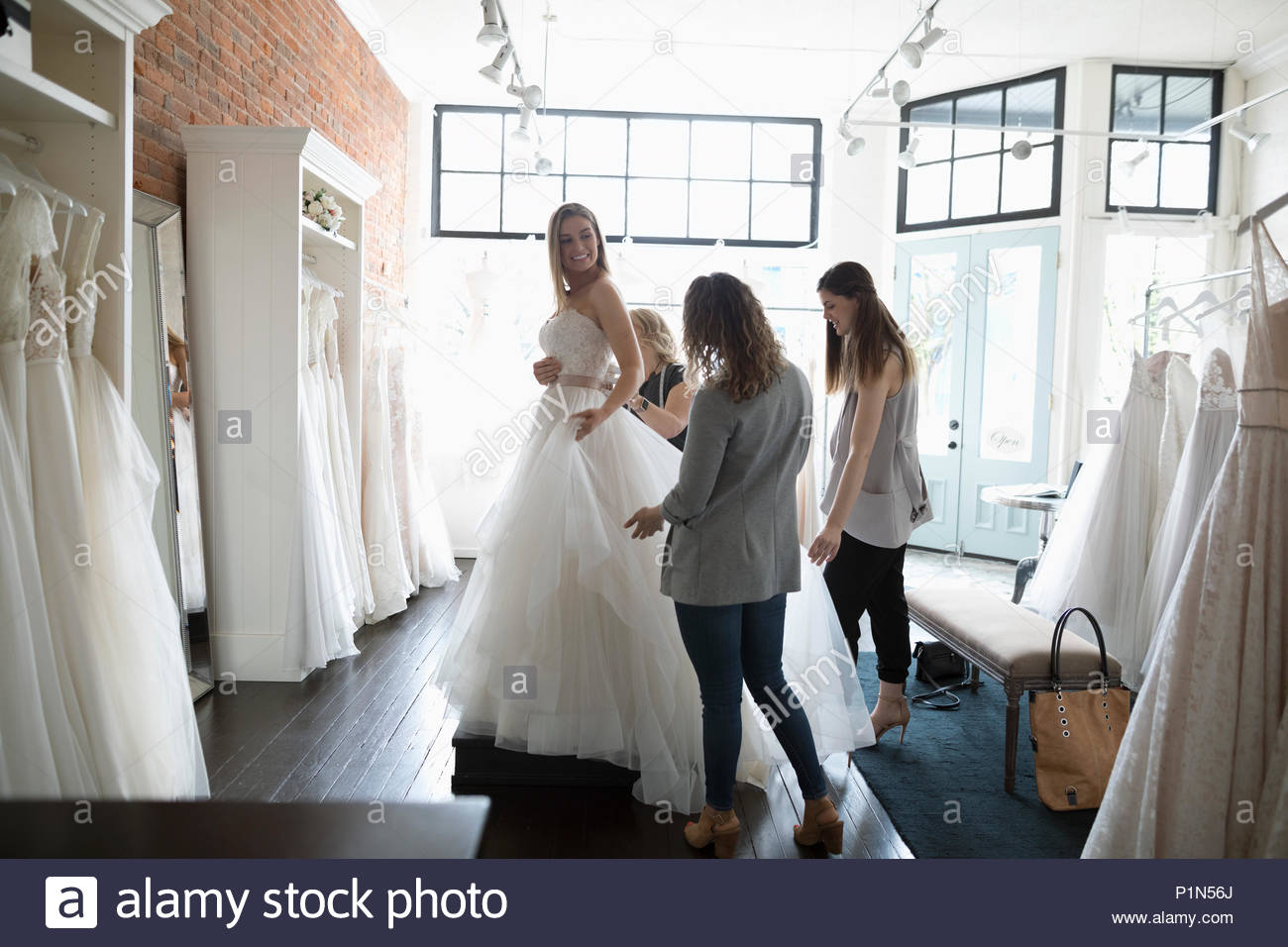 Woman wedding dress friends hi-res stock photography and images - Alamy