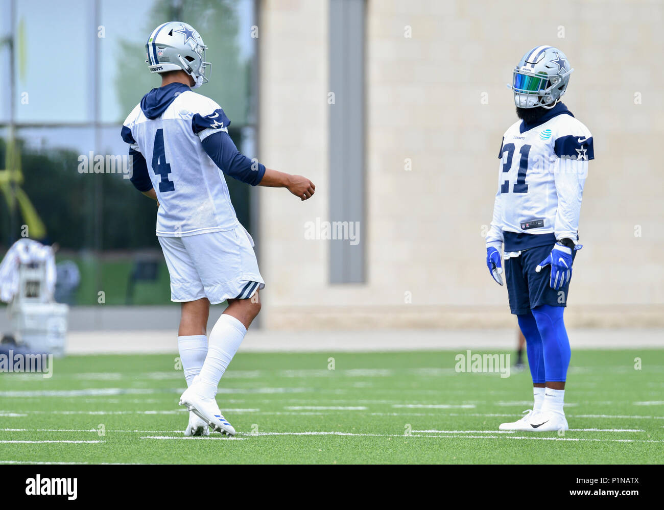 Jun 12, 2018: Dallas Cowboys quarterback Dak Prescott #4 speaks with Dallas Cowboys running back ...