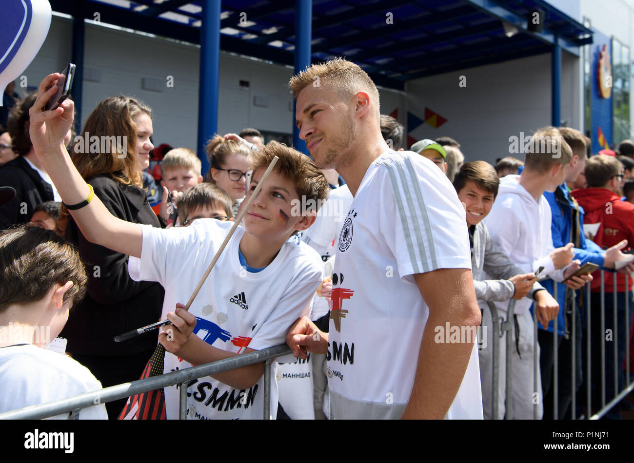 After the training, Joshua Kimmich (Germany) poses for selfies and ...