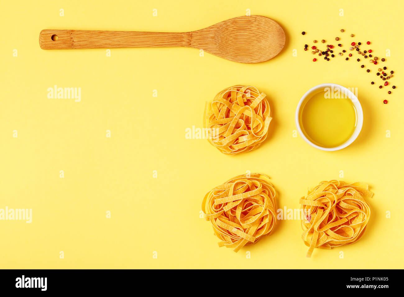 Flat lay pastel tone background. Ingredients for cooking on a yellow ...