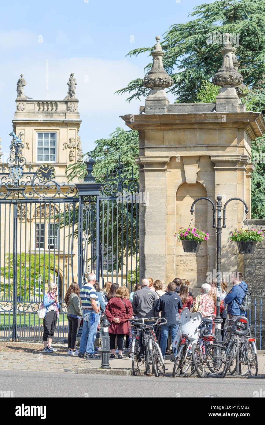 A tour group of schoolchildren walk along Deadman's Walk, with Merton ...
