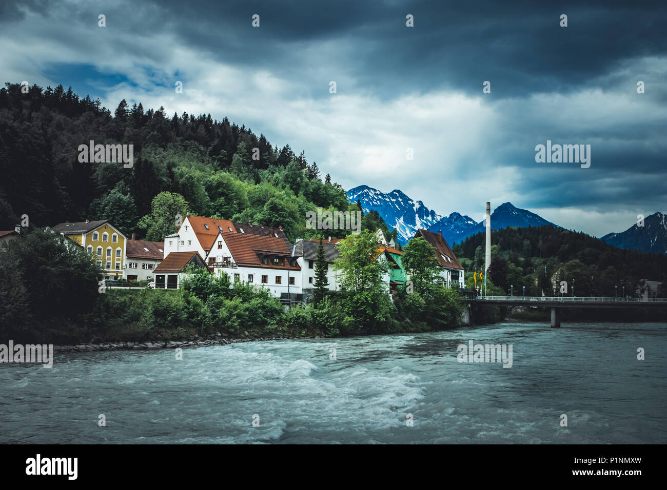 Füssen, Germany - May 10, 2018: Traditional, colorful buildings and the ...