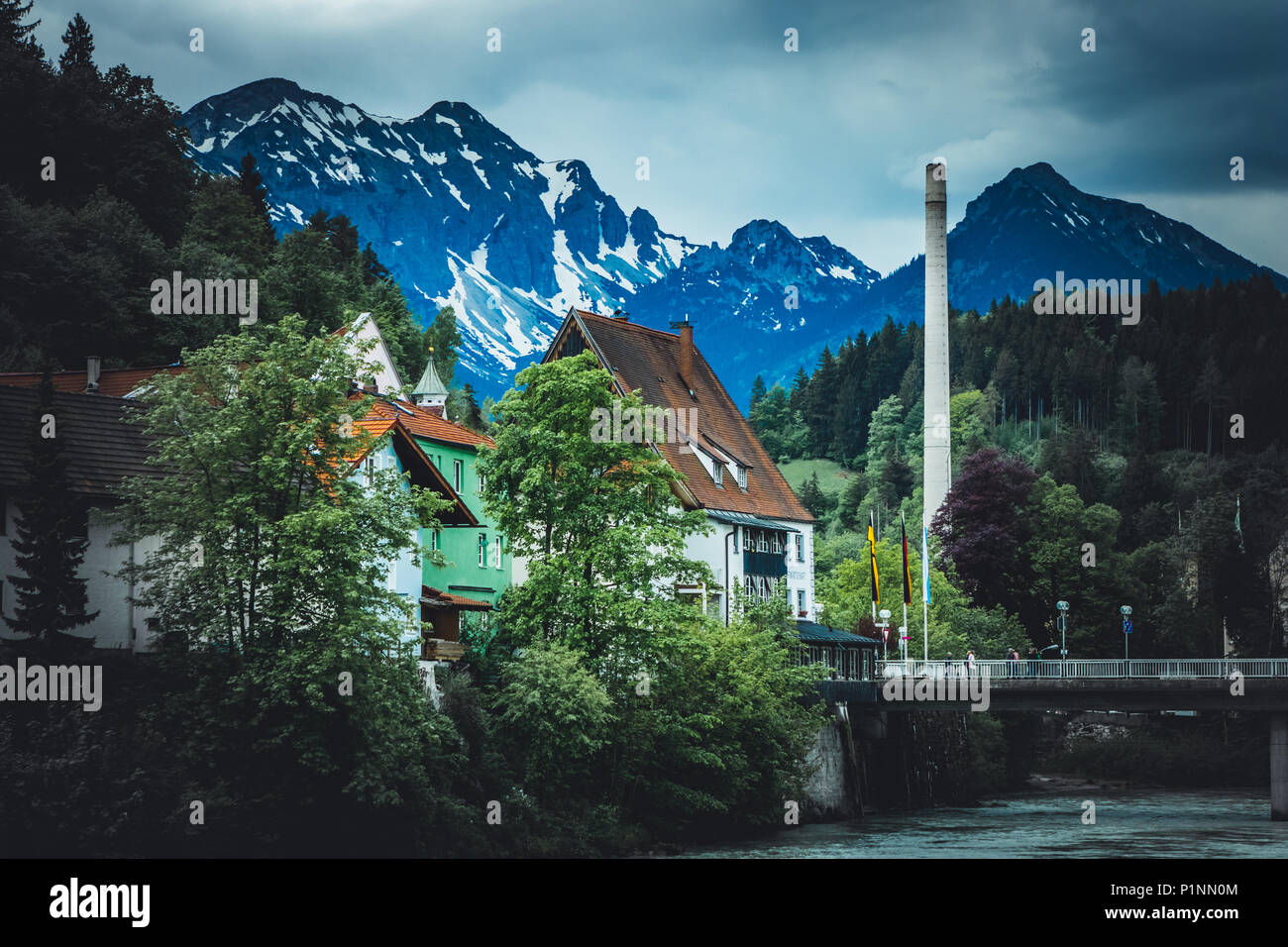 Füssen, Germany - May 10, 2018: Traditional, colorful buildings and the ...