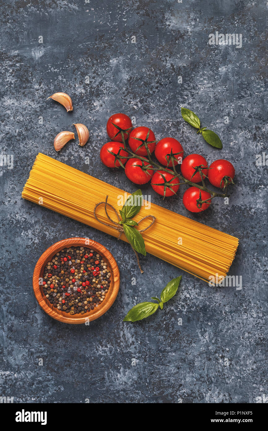 Italian food background with pasta, spices and vegetables. Top view ...