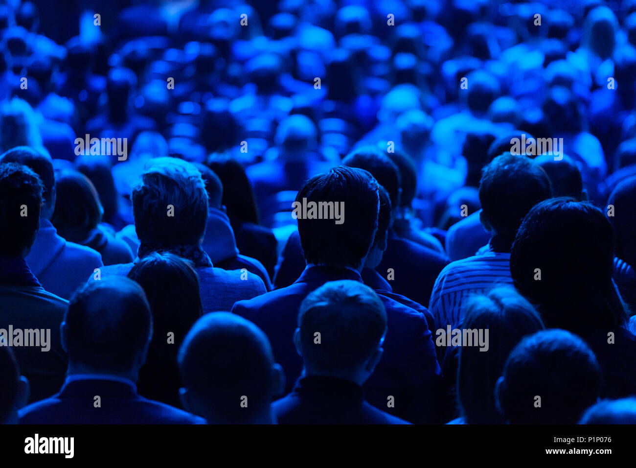 Audience listens lecturer conference hall hi-res stock photography and ...