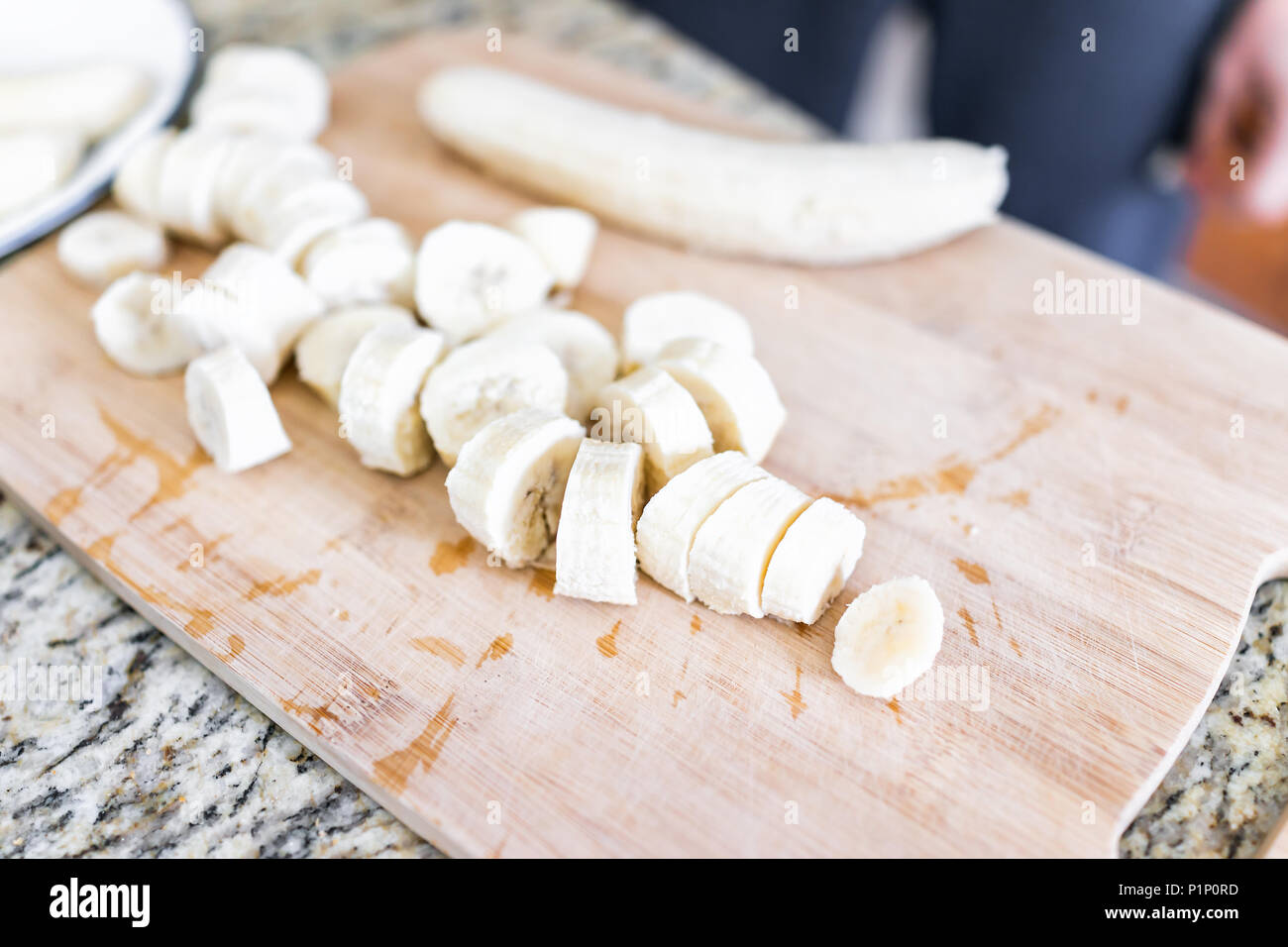 Slicing banana hi-res stock photography and images - Alamy