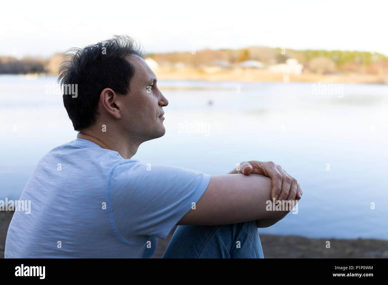 Man sitting sad side hi-res stock photography and images - Alamy