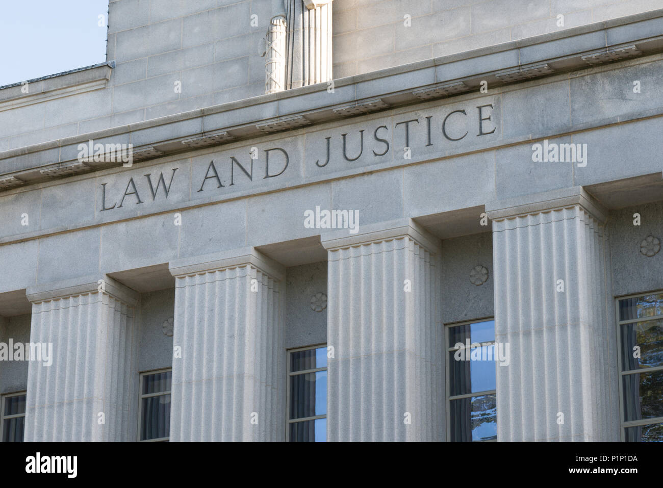 Stone Facade of Courthouse with Law and Justice Stock Photo - Alamy