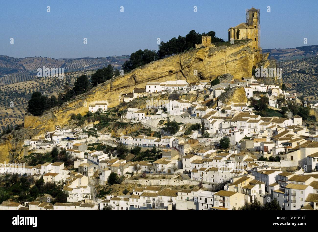 Montefrío, town view and church at the hill summit Stock Photo - Alamy